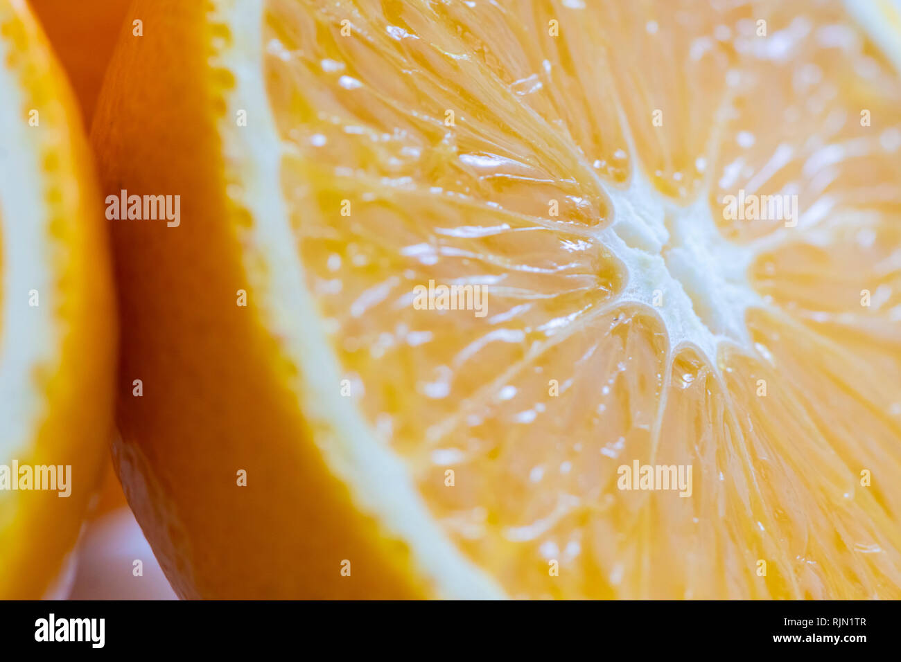 Juicy orange isolated on white background Stock Photo - Alamy