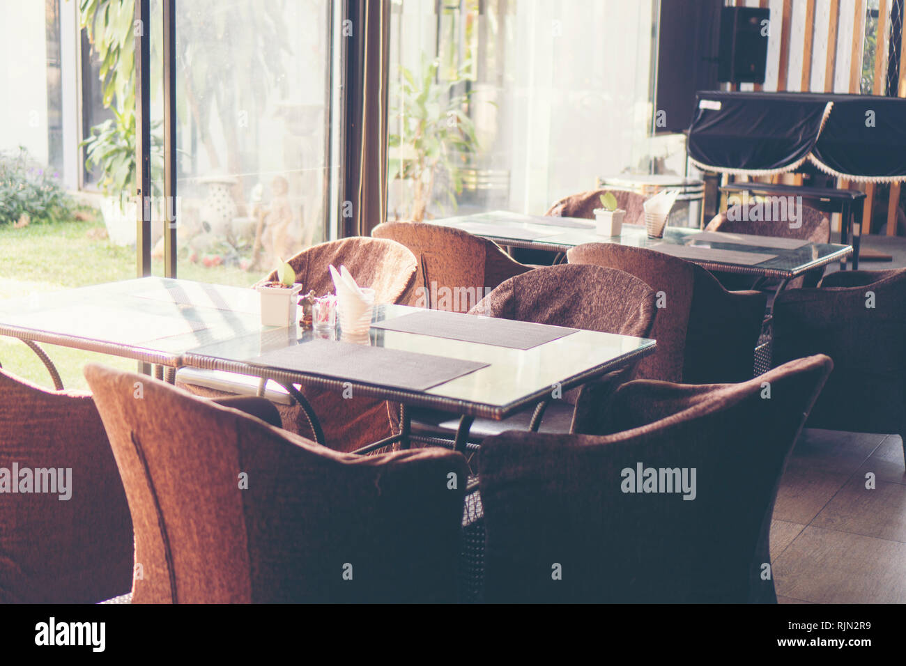 Tables and chairs empty in canteen Stock Photo - Alamy