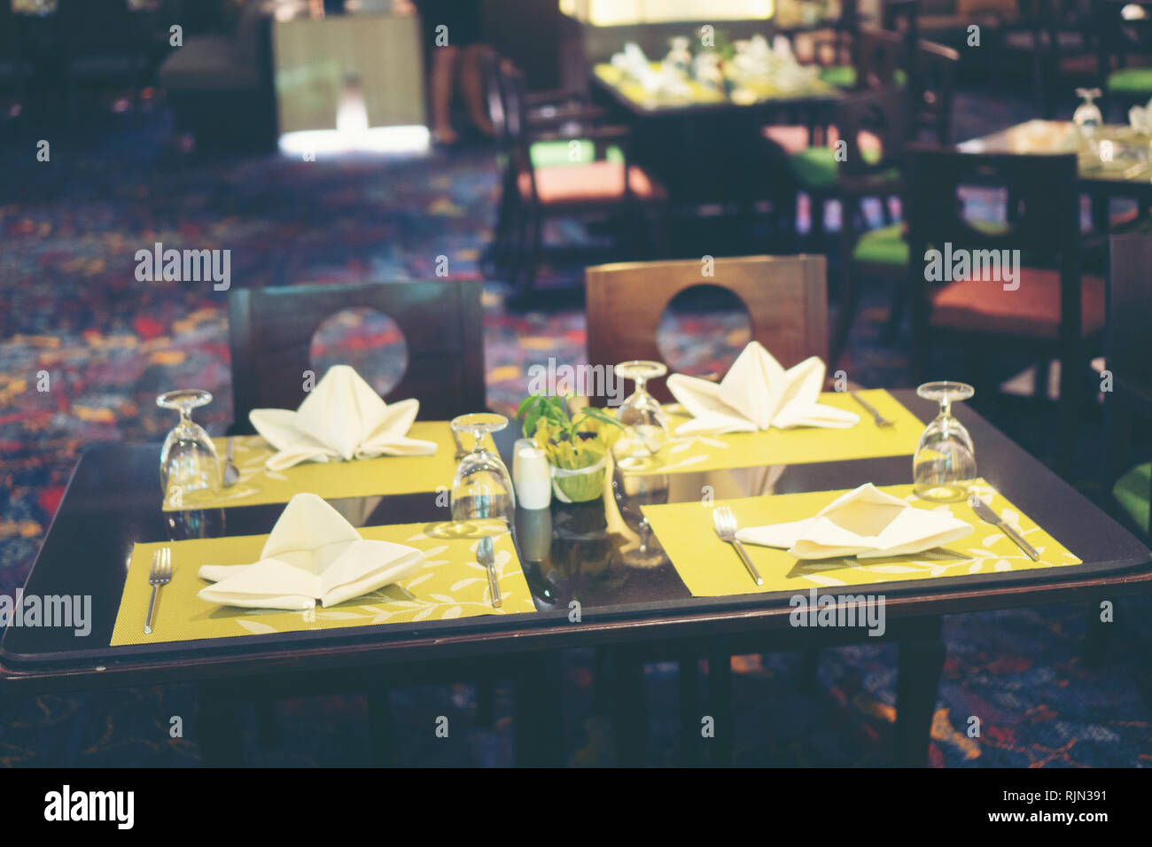 Dinner table in a luxury hotel Stock Photo - Alamy