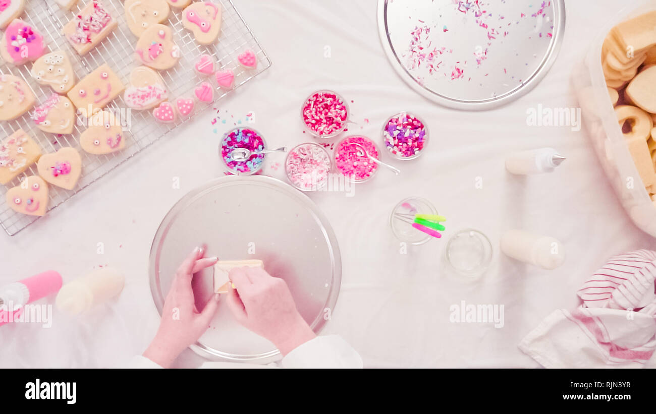 Flat lay. Step by step. Decorating sugar cookies with royal icing and ...