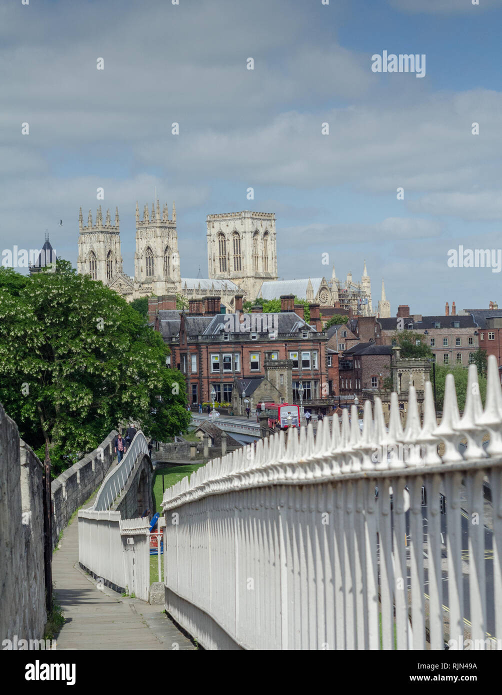 A portion of the city wall surrounding the old section of York, England ...