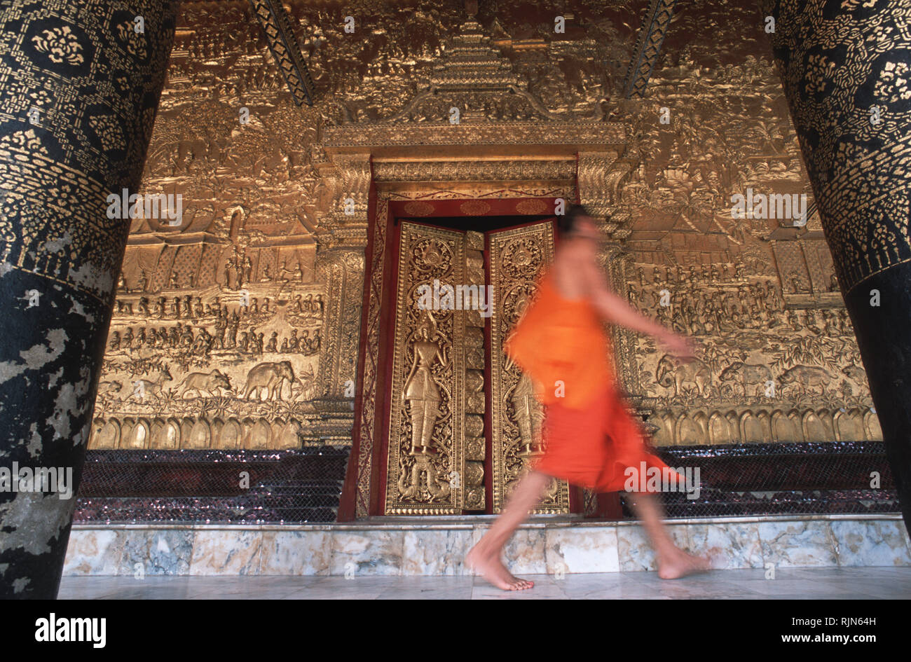 Novice monk in door of temple hi-res stock photography and images - Alamy