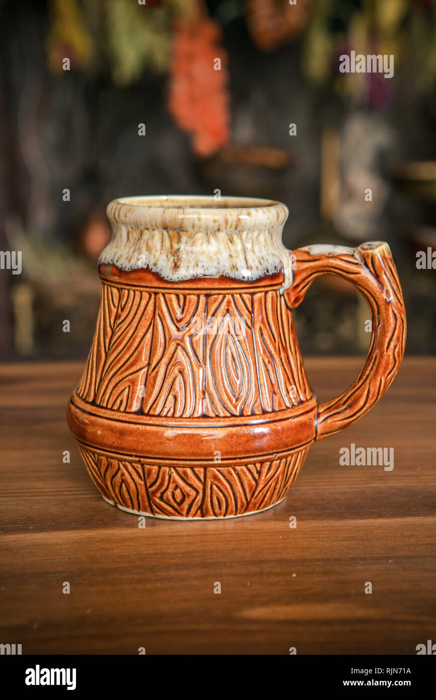 Still life with a ceramic mug with beer in a tavern Stock Photo - Alamy