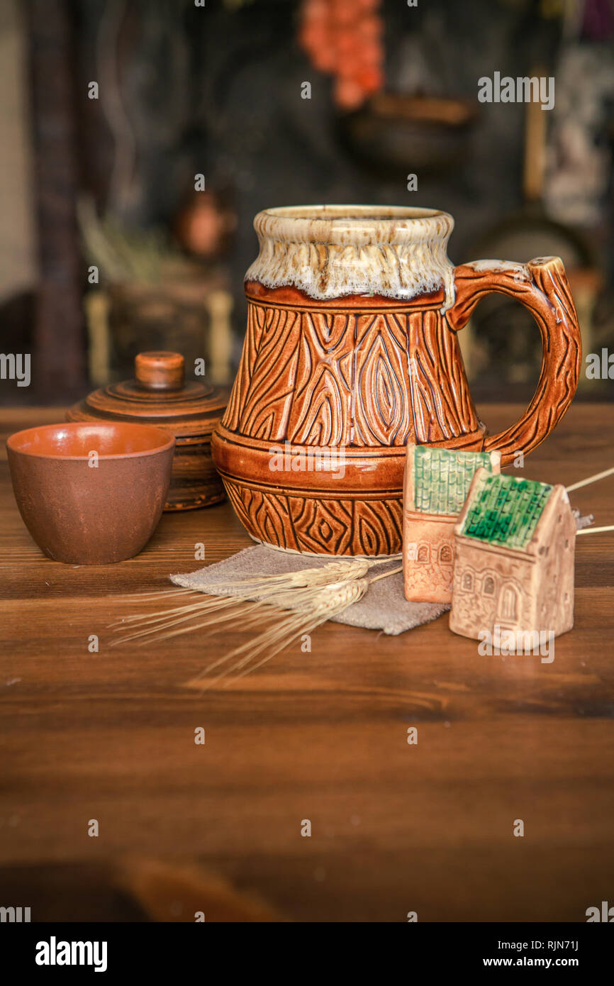 Still life with a ceramic mug with beer in a tavern Stock Photo - Alamy