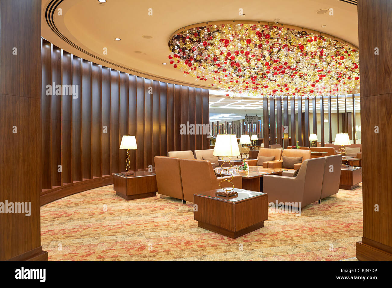 DUBAI, UAE - MARCH 31, 2015: interior of Emirates first class lounge ...