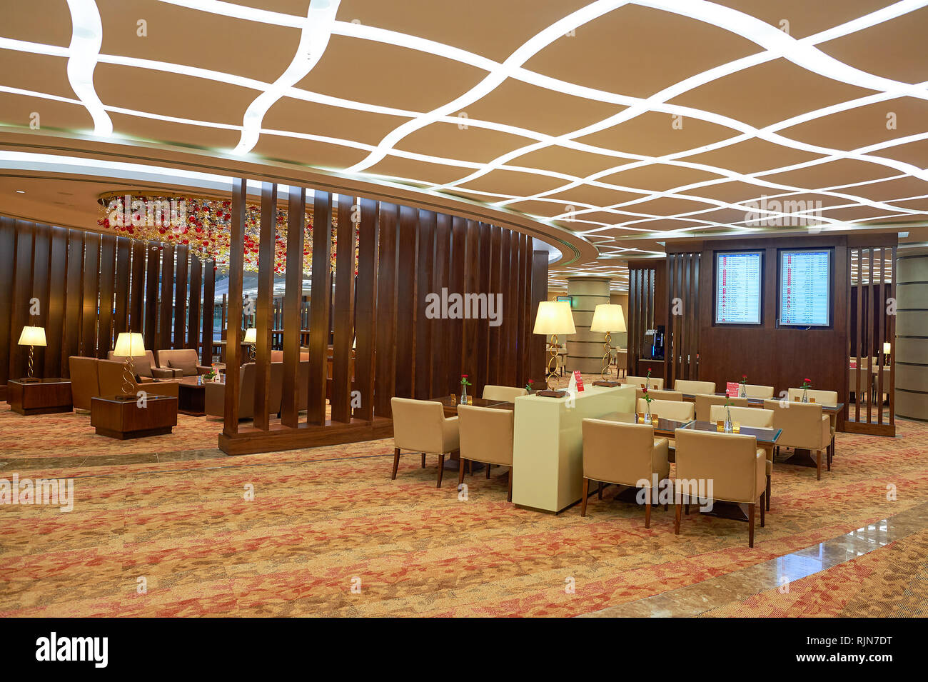 DUBAI, UAE - MARCH 31, 2015: interior of Emirates first class lounge ...