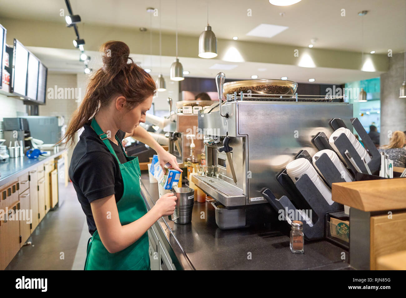 Starbucks worker beverage hi-res stock photography and images - Alamy
