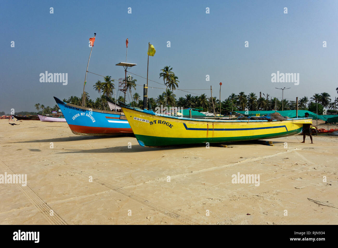 Fishing boats at Colva Beach Goa, India Stock Photo - Alamy