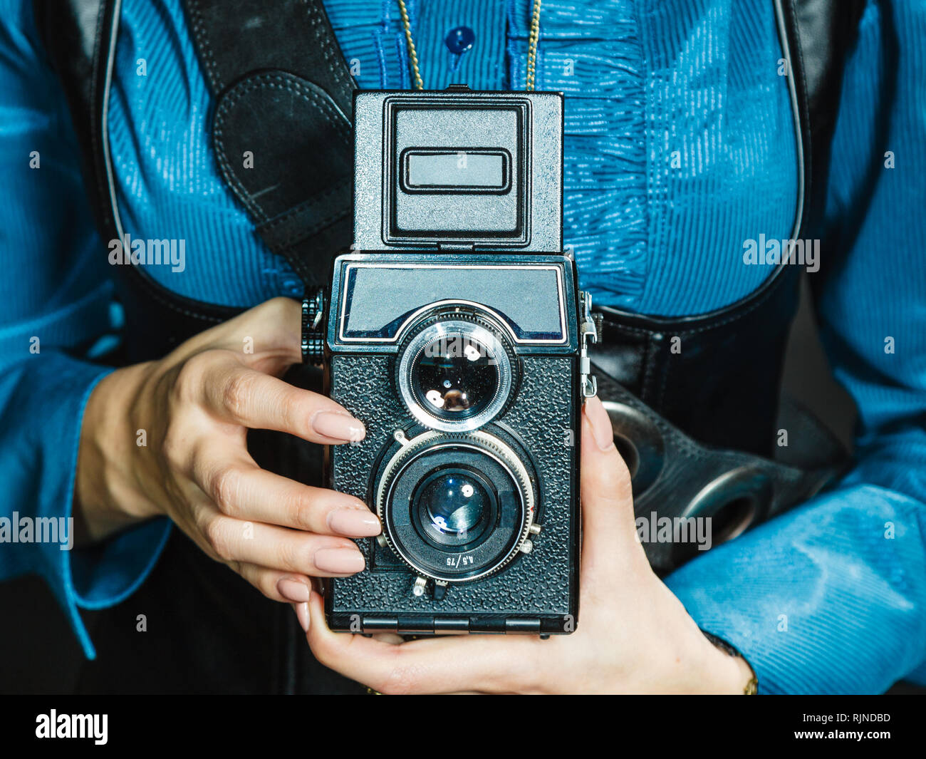 Photography and retro style. Young vintage attractive girl holds old ...