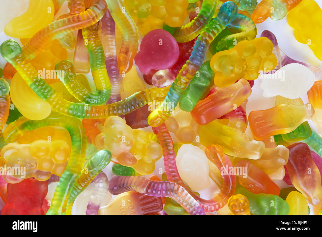 colorful neon gummy candies use as a background Stock Photo - Alamy