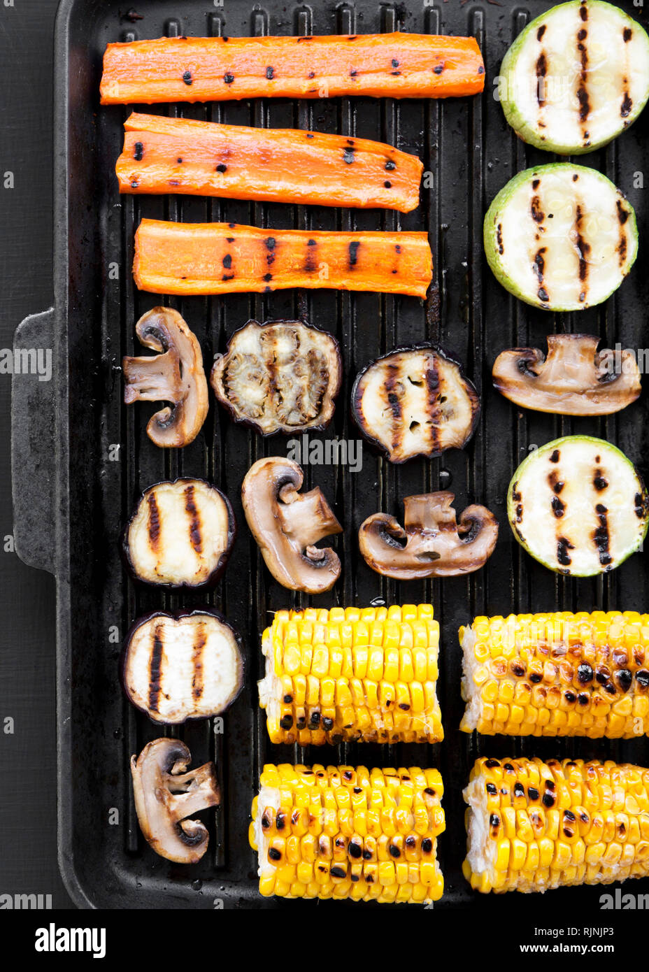 Grilled vegetables in a grilling pan, top view. From above, overhead ...