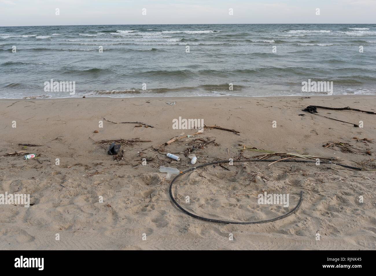 Dirty beach stripes Stock Photo - Alamy
