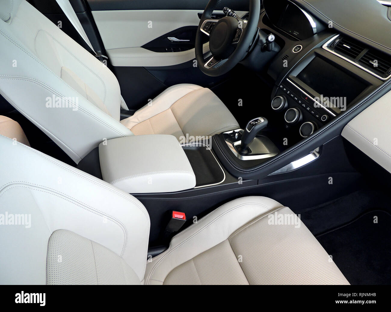 Top view of front seats, dashboard and controls panel in leather car ...