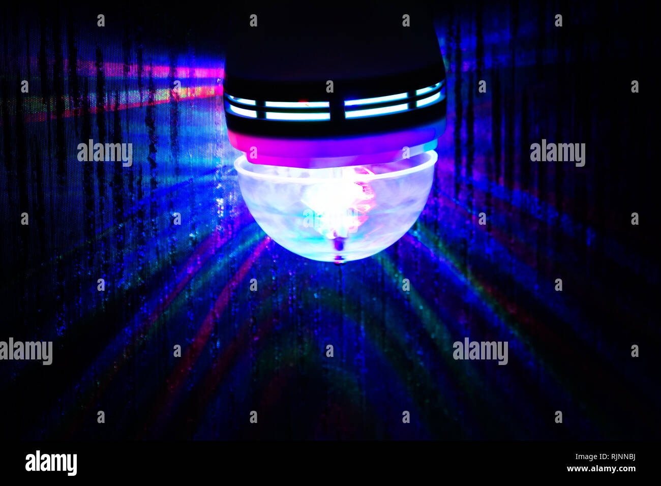 Wall-mounted rotating lantern with multi-colored lighting Stock Photo ...