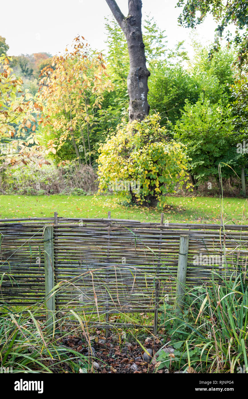 Bamboo palisade in a garden, autumn, Somme, France Stock Photo - Alamy