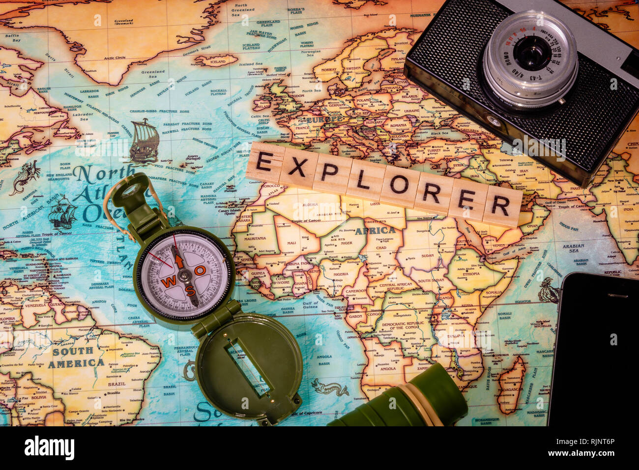 Explorer letters on map Stock Photo - Alamy
