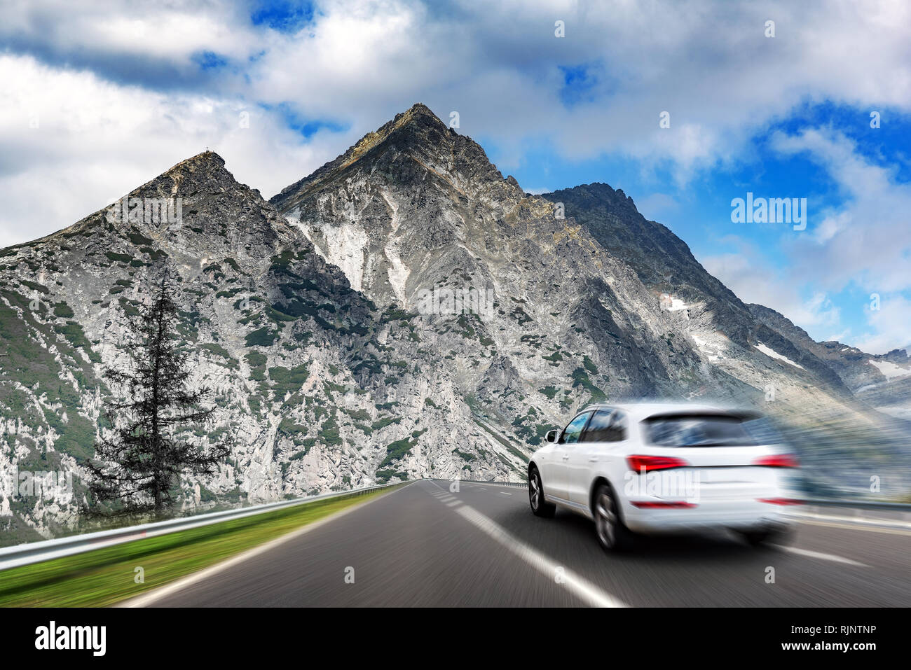 White car moving on highway Stock Photo - Alamy