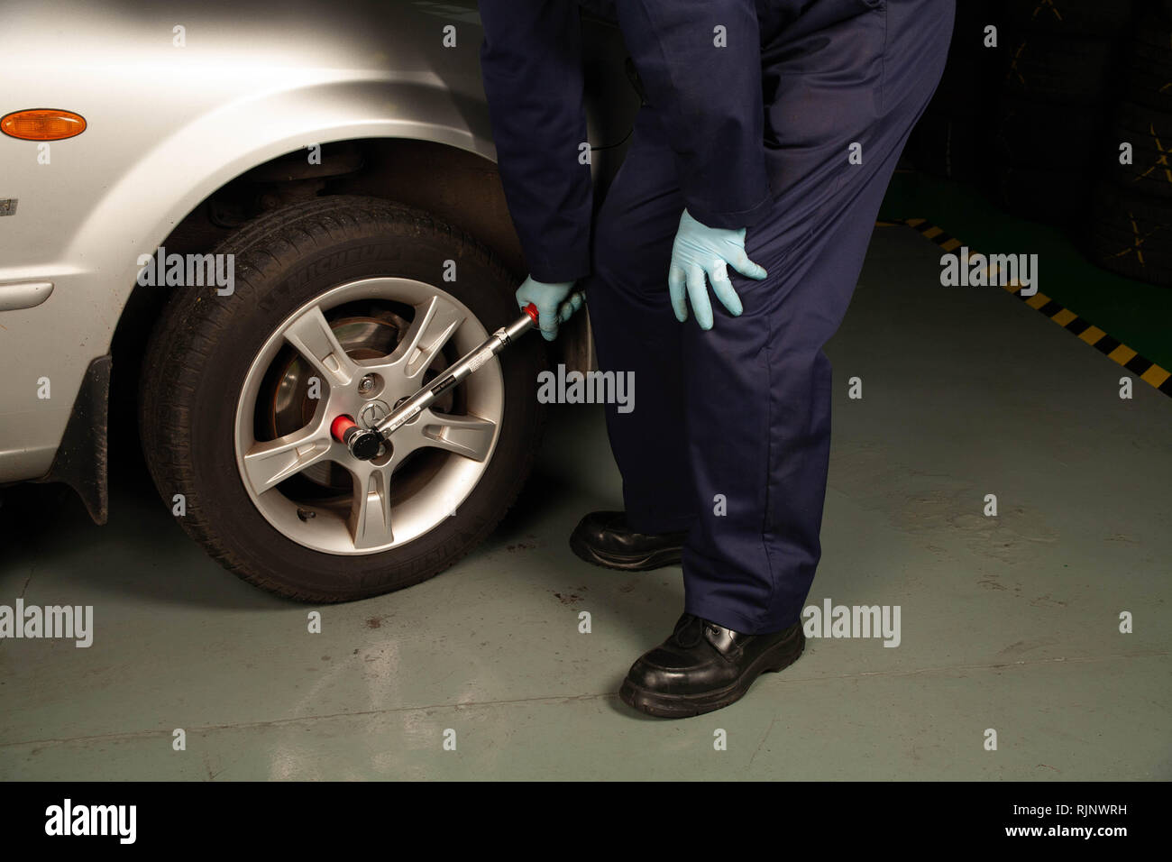 Fitting tire to hub hi-res stock photography and images - Alamy