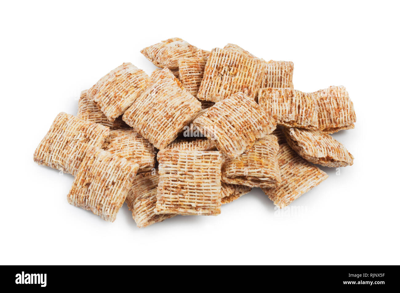 Studio shot of miniature bite size shredded wheat isolated against a ...