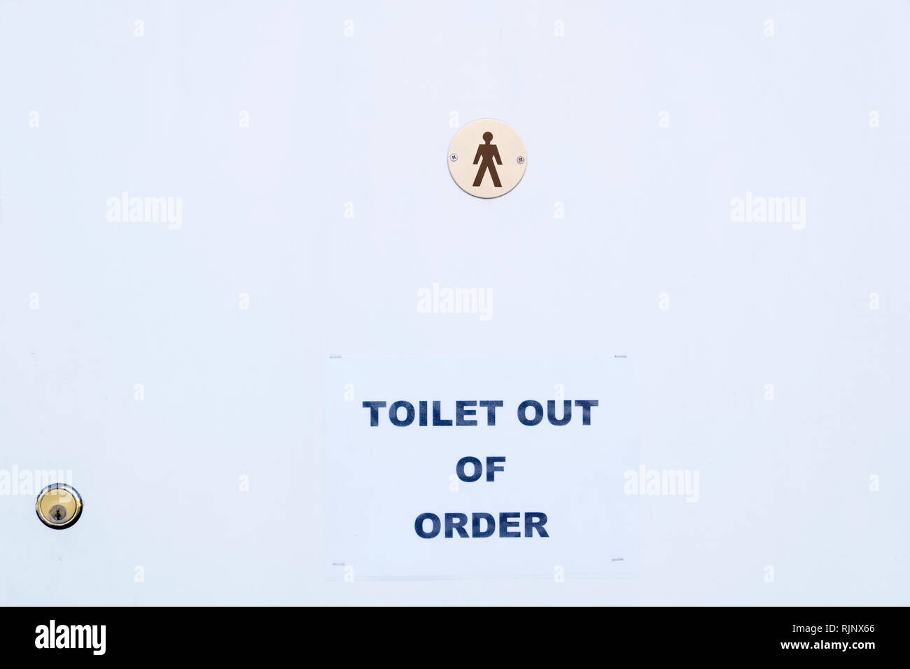 Male toilet broken out of order sign Stock Photo - Alamy