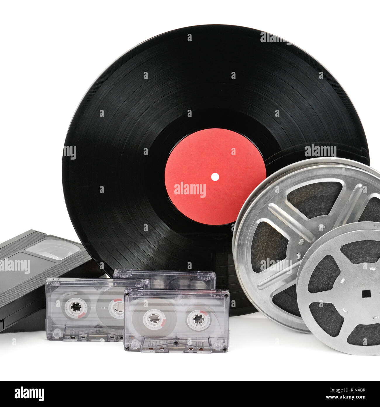 audio cassettes, records and film strip isolated on white background ...