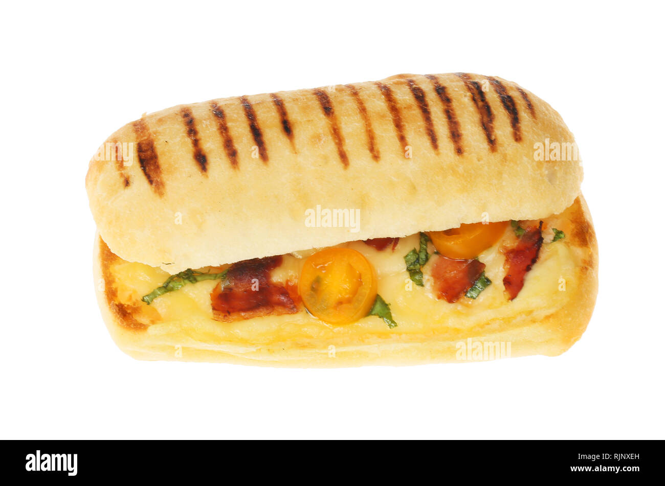 Cheese, tomato, basil and pancetta panini isolated against white, top ...