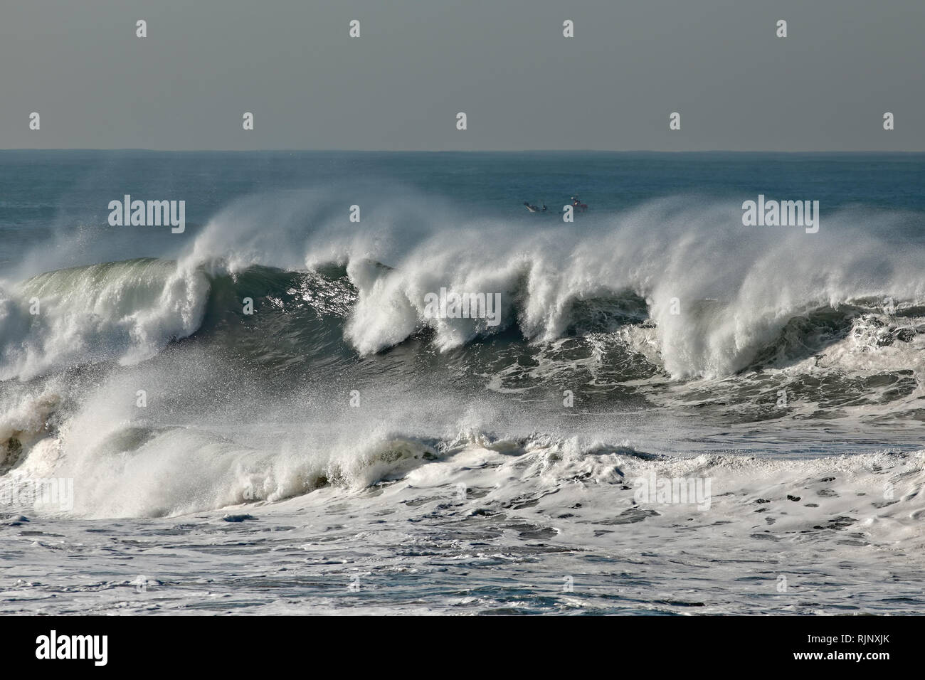 Small boat big wave hi-res stock photography and images - Alamy