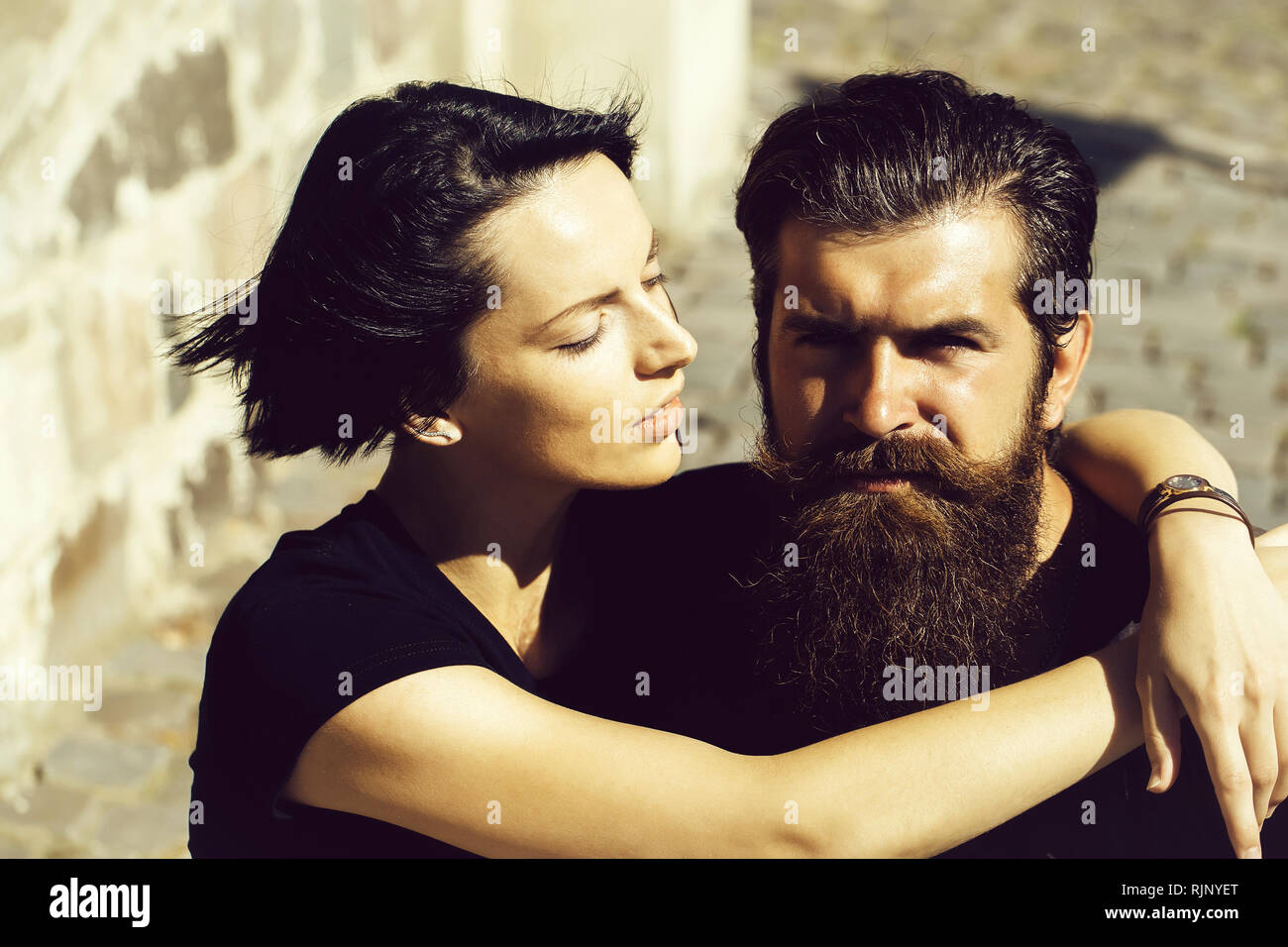 Young couple hug Stock Photo - Alamy