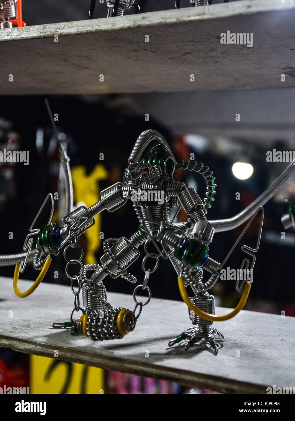 The robot is assembled from springs and wire. The robot is assembled ...