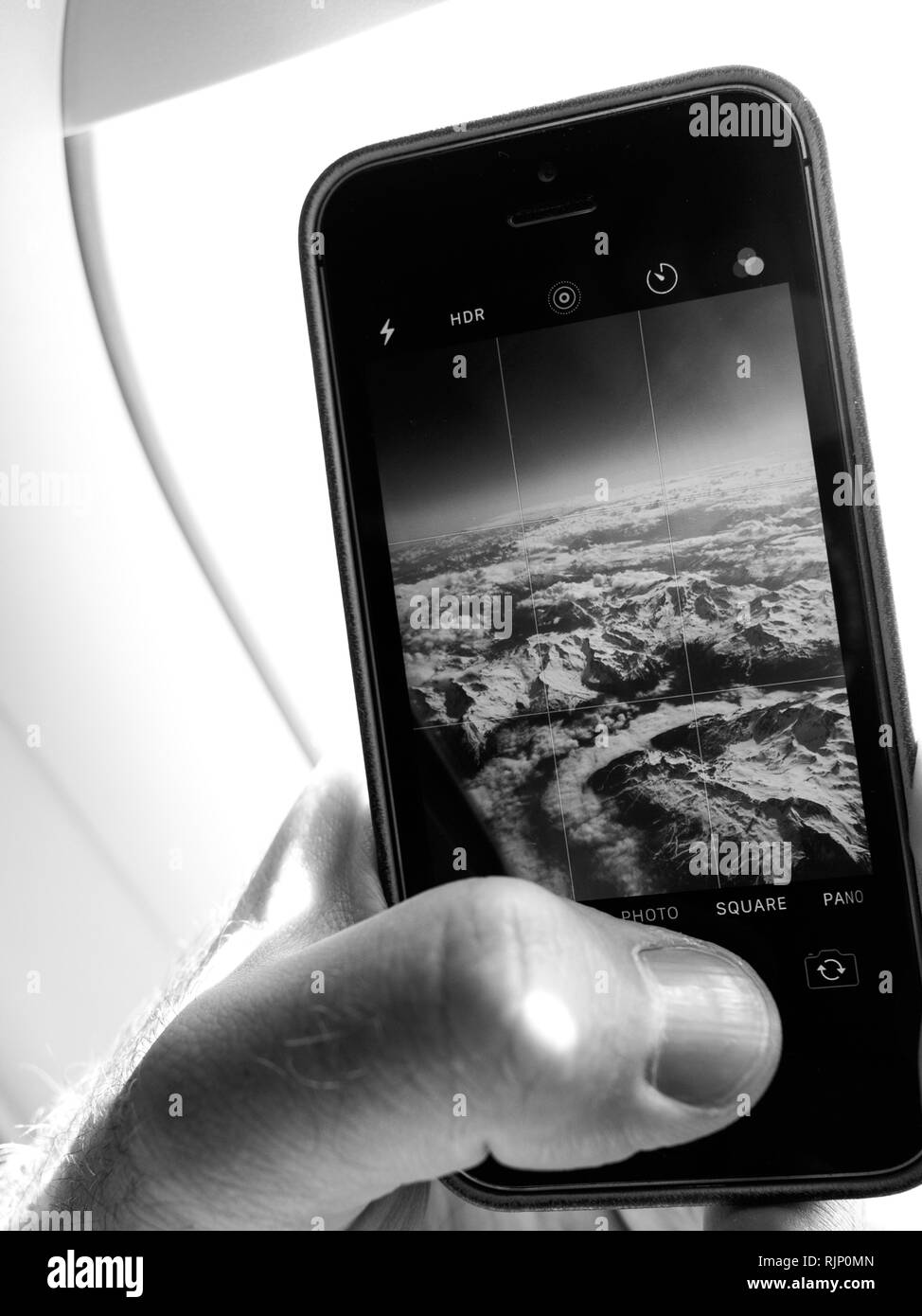 Hand smartphone taking photo Black and White Stock Photos & Images - Alamy