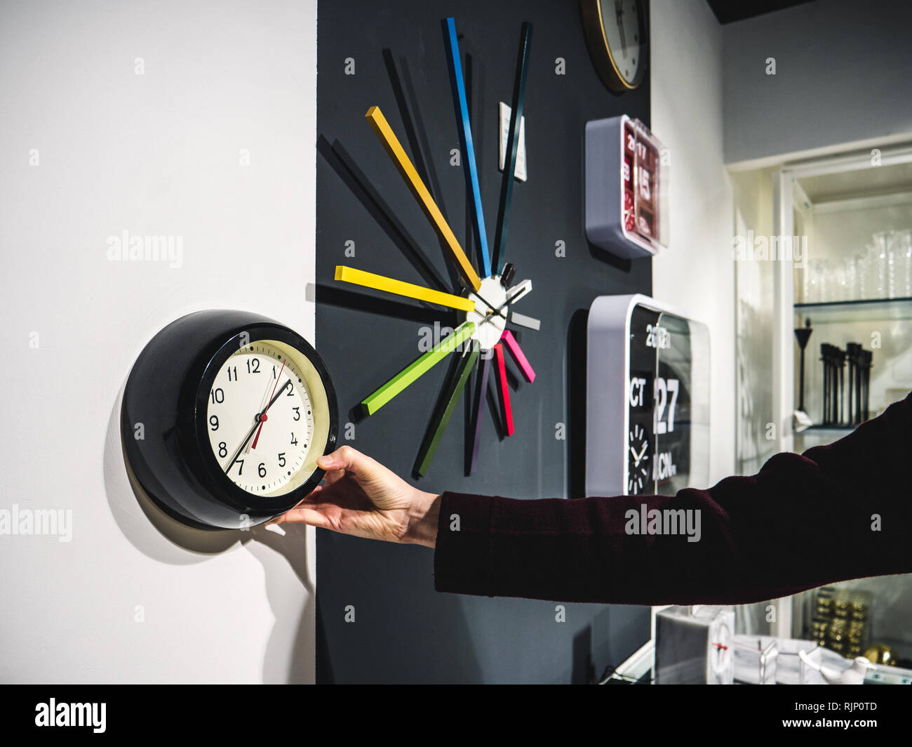 Hanging clock in shopping mall hi-res stock photography and images - Alamy