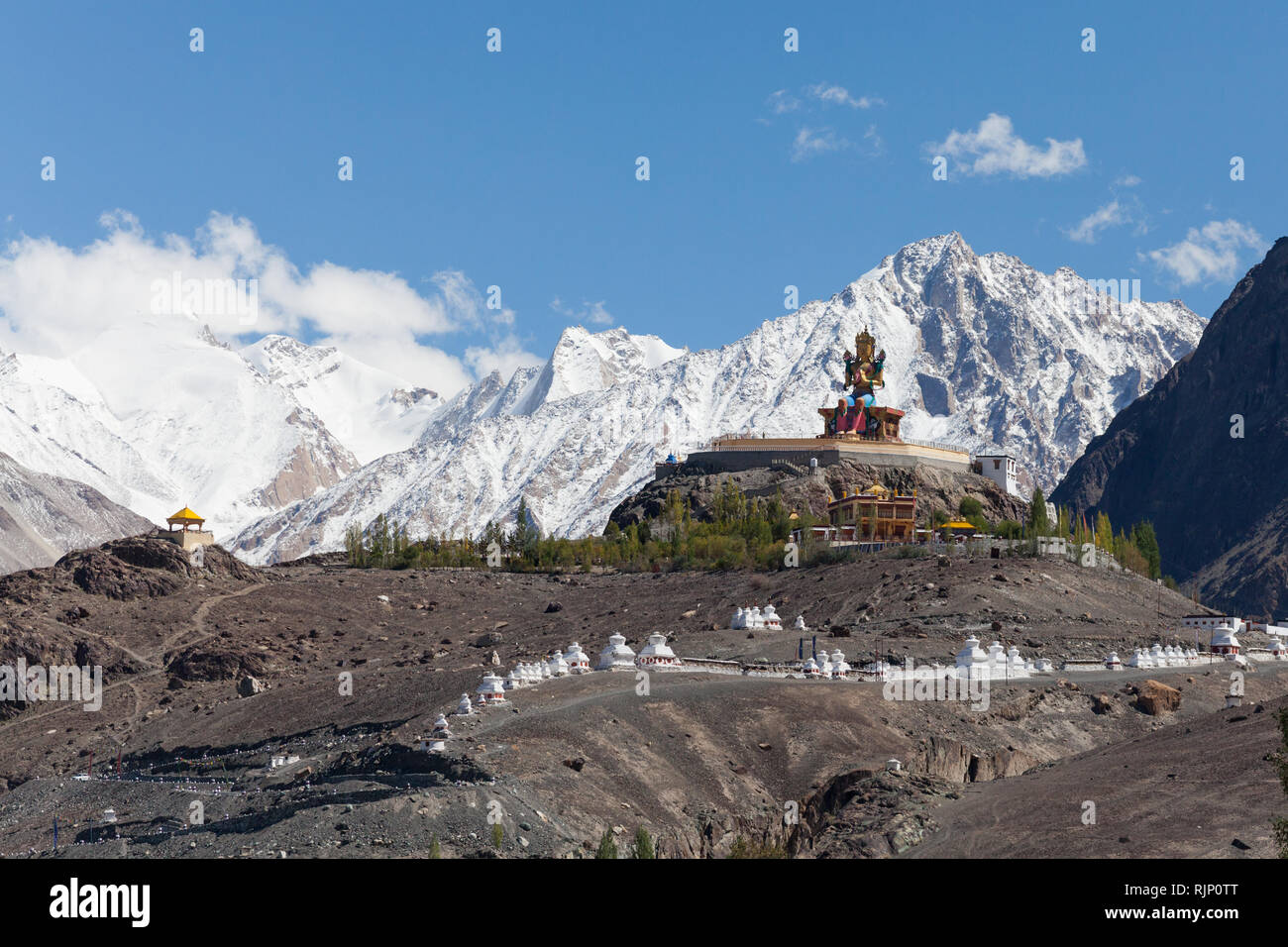 Statue of Jampa (Maitreya) Buddha and many chortens near Diskit Gompa ...