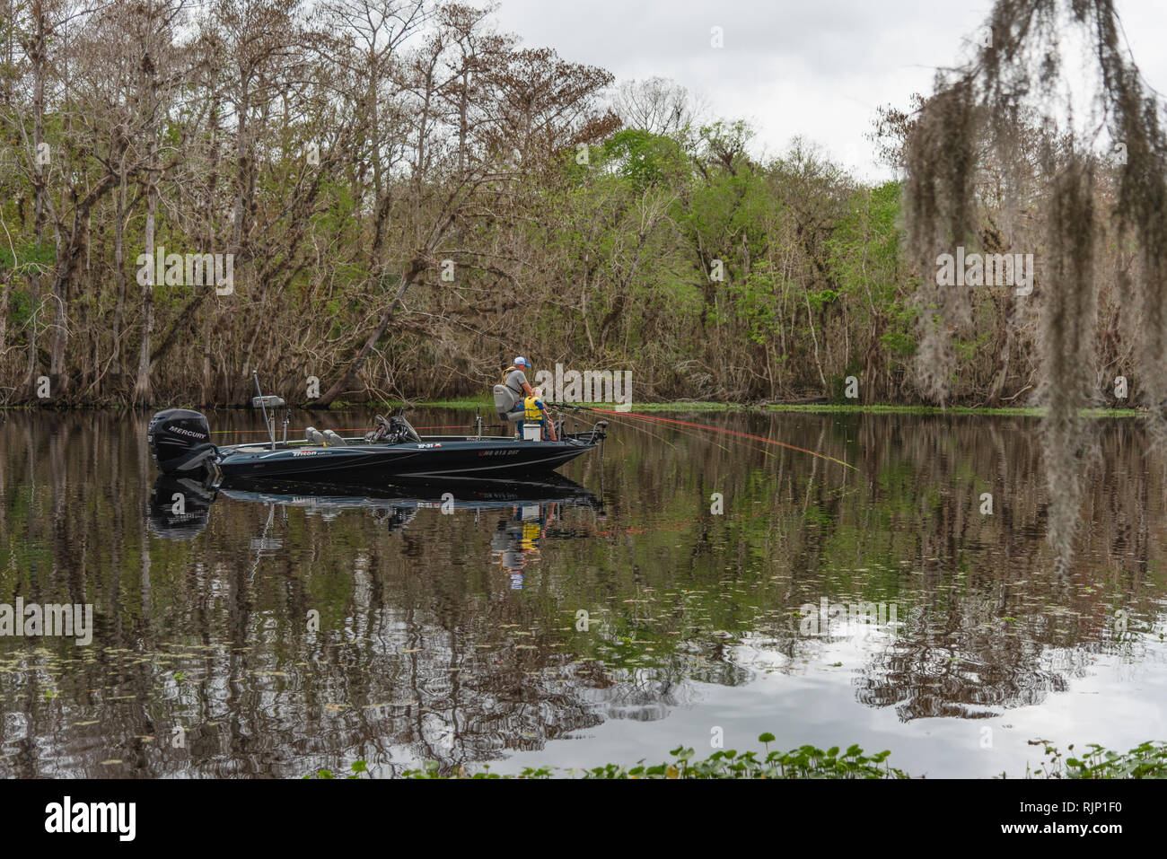 Man and young child fishing on the St.Johns River in Volusia County ...