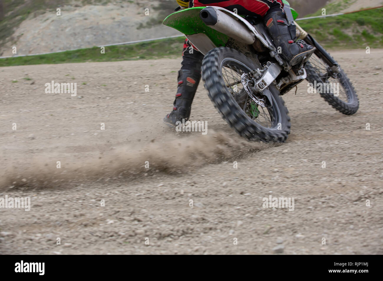 Professional motocross motorcycle rider driving hi-res stock ...