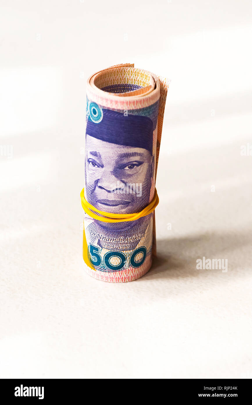 Nigerian Money - A stash of 500 Naira notes rolled up in a bundle Stock ...