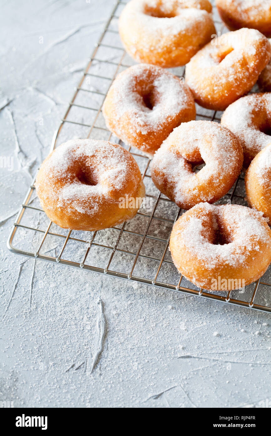 Bunch of homemade donuts with powdered sugar Stock Photo - Alamy