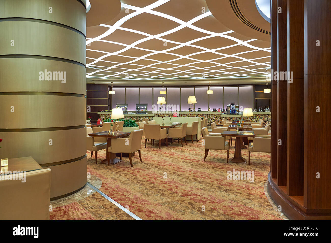 DUBAI, UAE - MARCH 31, 2015: interior of Emirates first class lounge ...