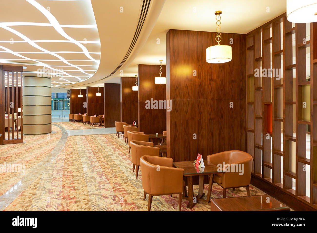 DUBAI, UAE - MARCH 31, 2015: interior of Emirates first class lounge ...