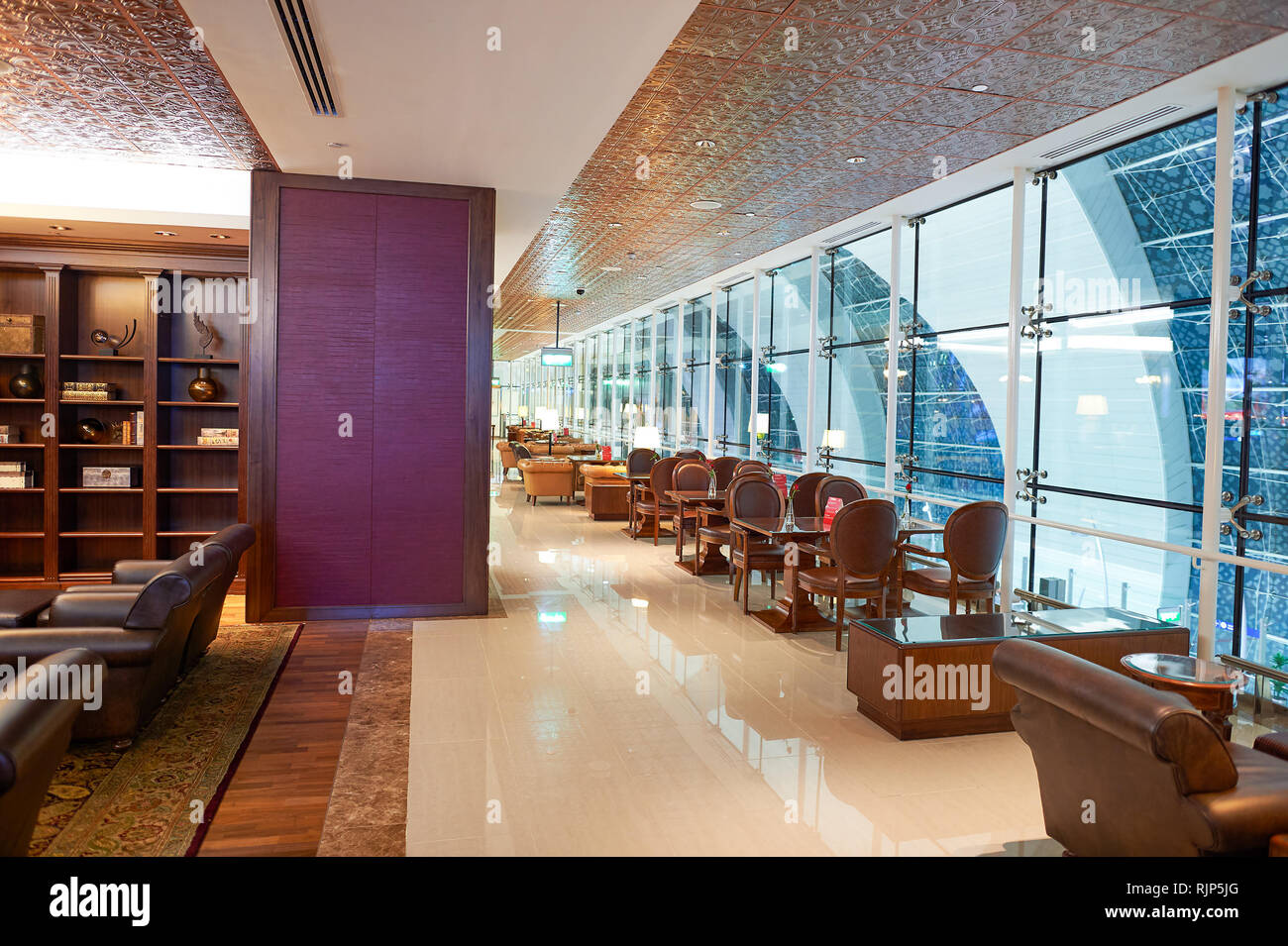 DUBAI, UAE - MARCH 31, 2015: interior of Emirates first class lounge ...