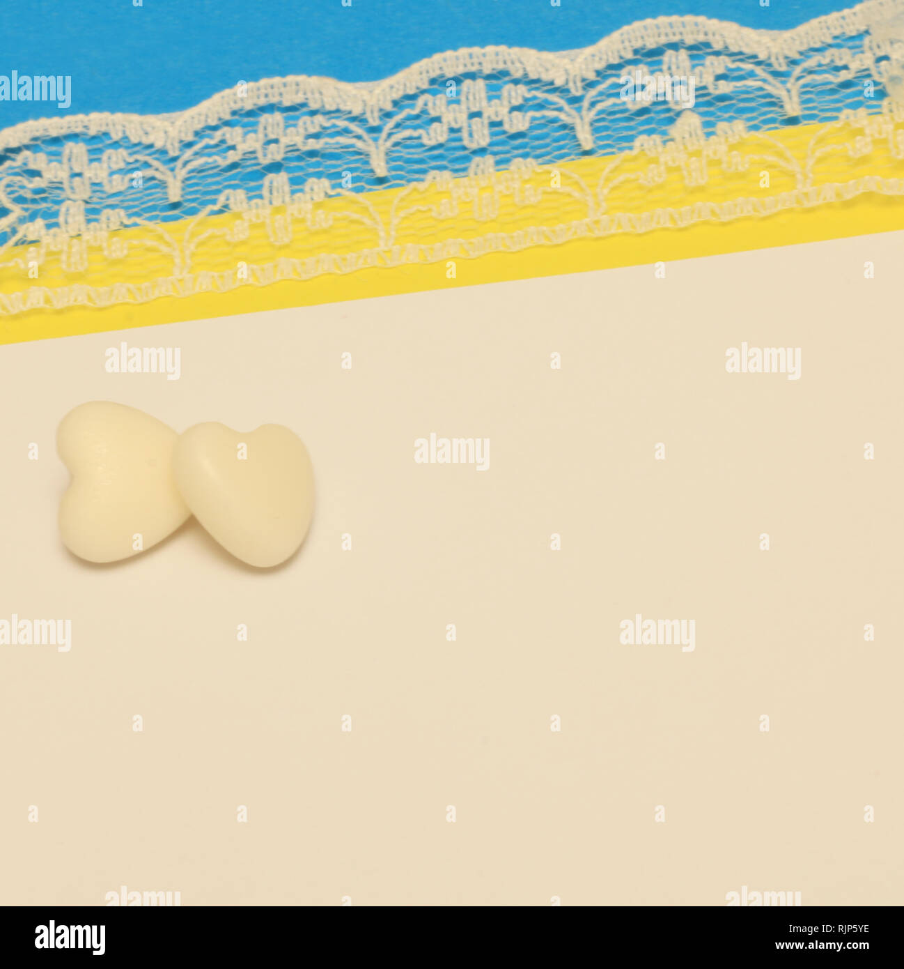 Creamy background with hearts Stock Photo - Alamy