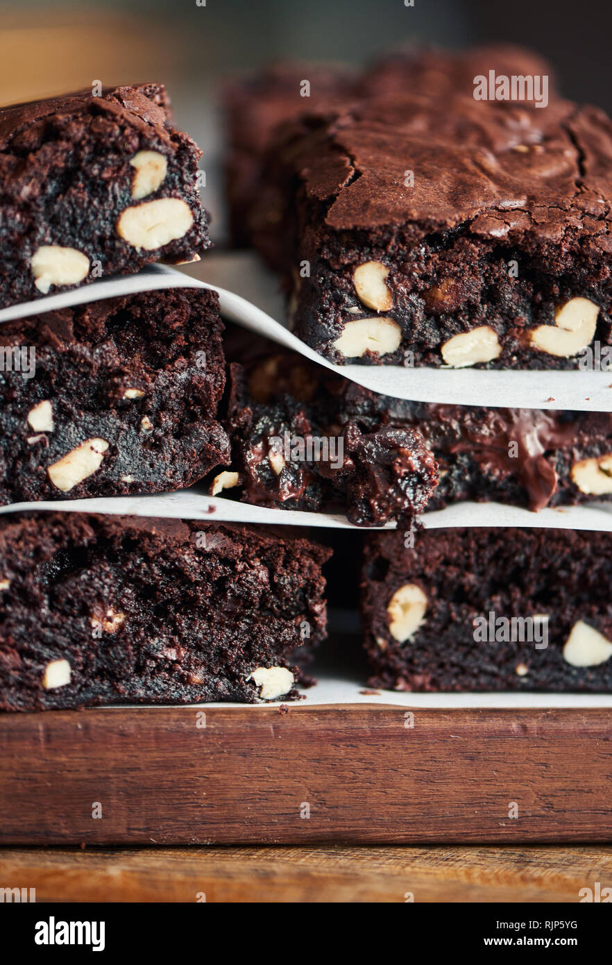 Freshly baked stack of delicious nutty chocolate brownies Stock Photo ...