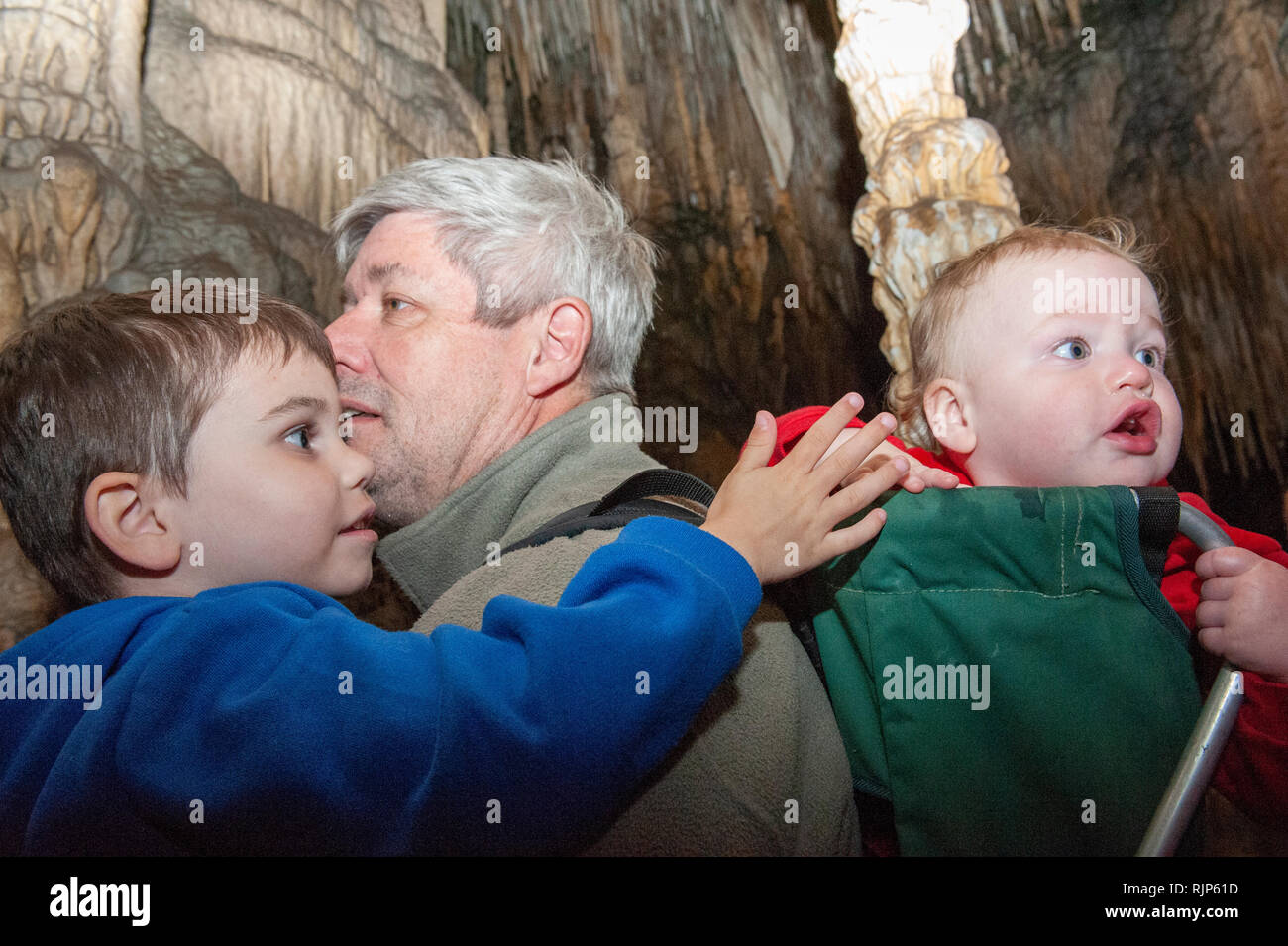 Children caving hi-res stock photography and images - Alamy