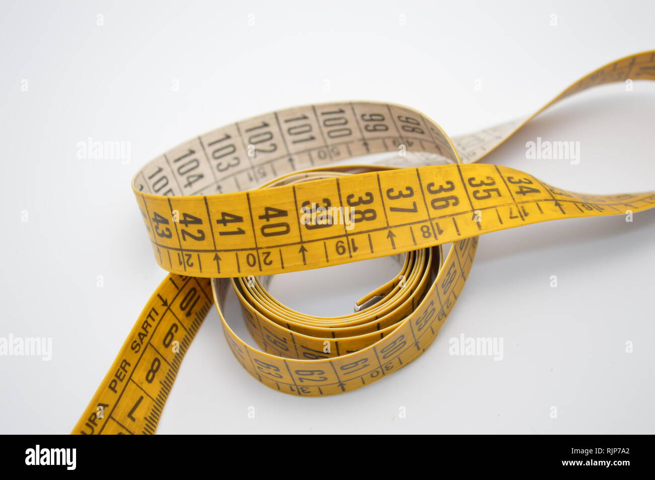 meter to measure for tailor fashion on white background Stock Photo - Alamy