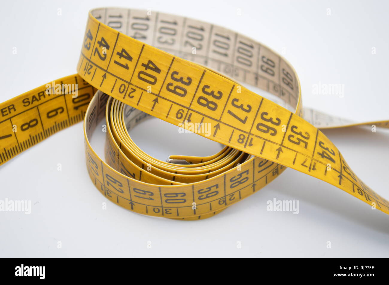 meter to measure for tailor fashion on white background Stock Photo - Alamy