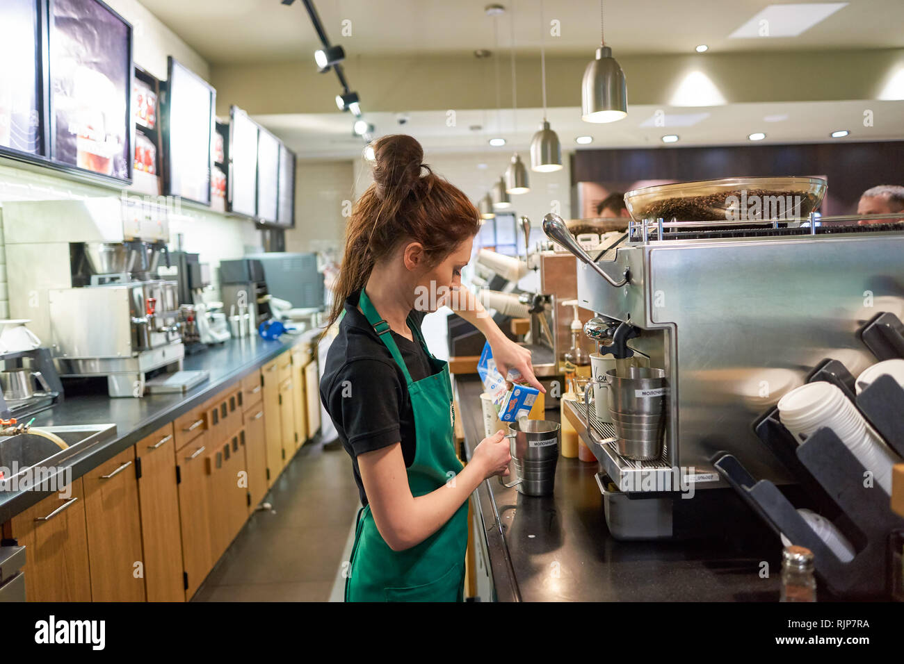 Starbucks worker beverage hi-res stock photography and images - Alamy