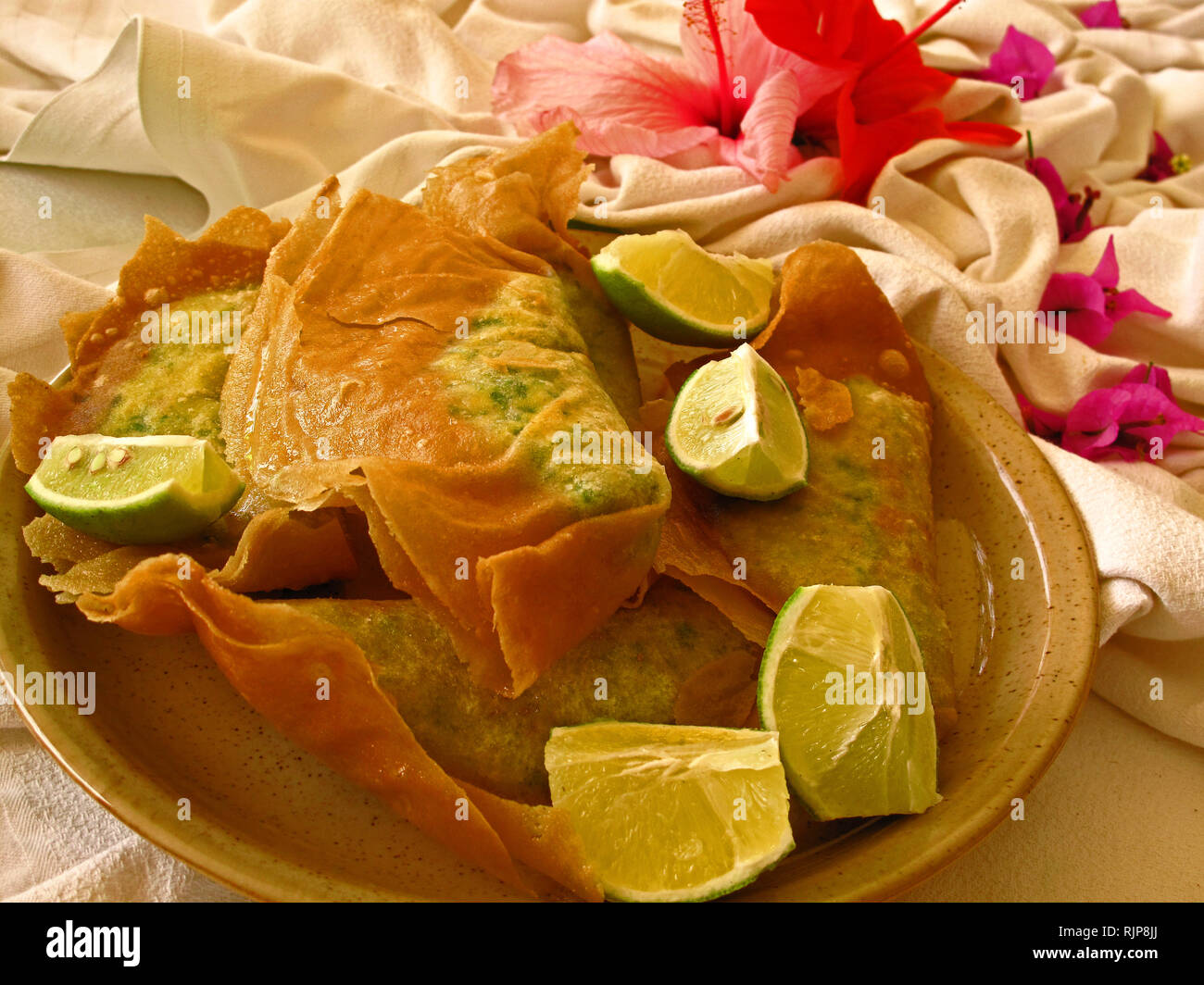 Traditional Tunisian food, brik fried pasteries with egg or some other ...