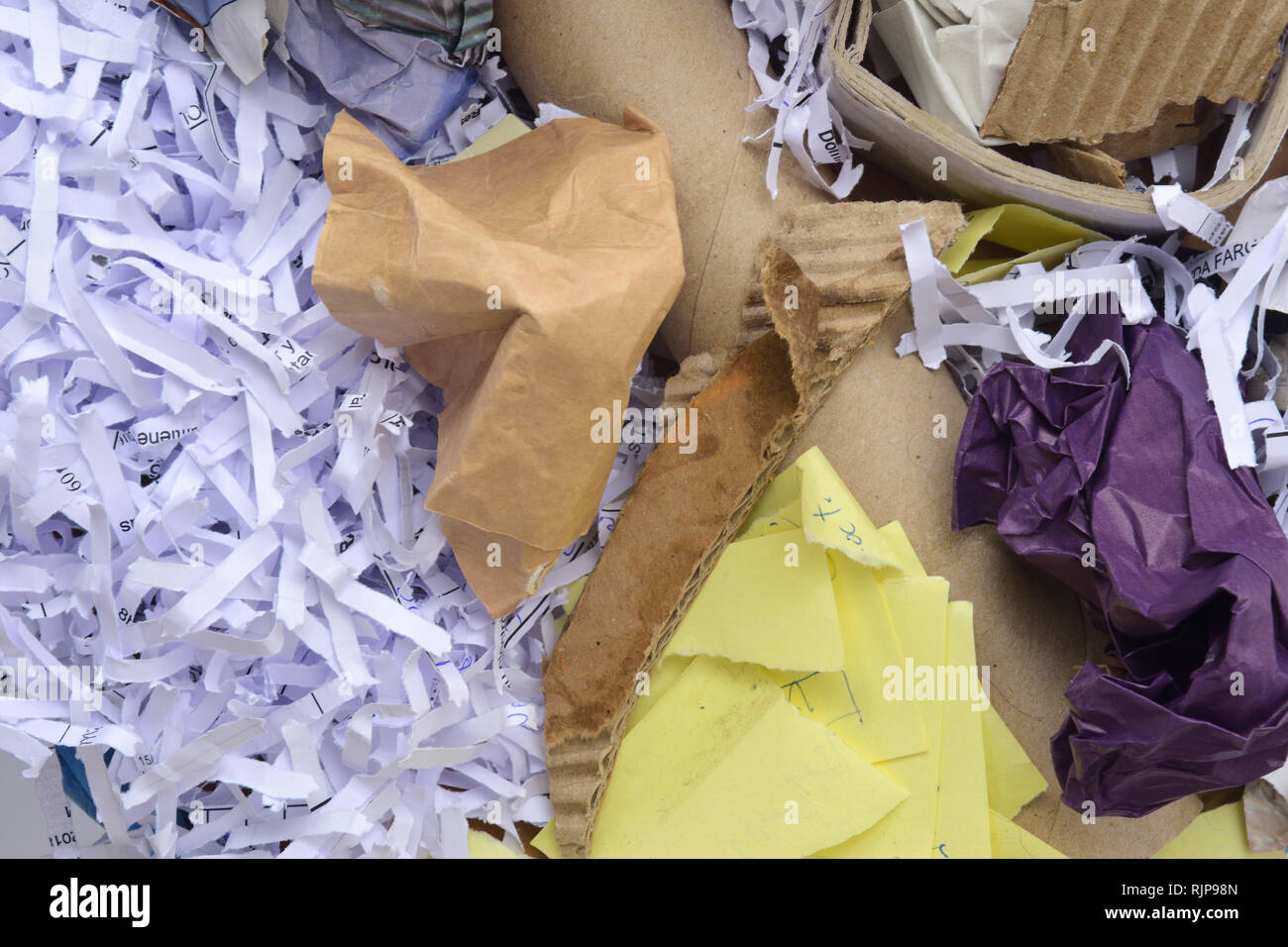 Detail of garbage with cardboard, shredded paper and paper Stock Photo ...