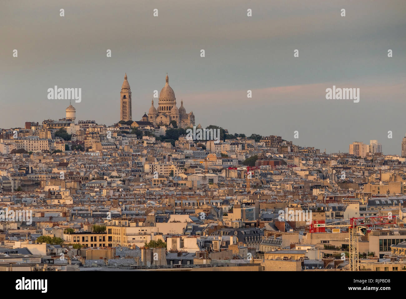 The Sacre-Cœur and Montmartre at sunset from the rooftop of the Arc de ...