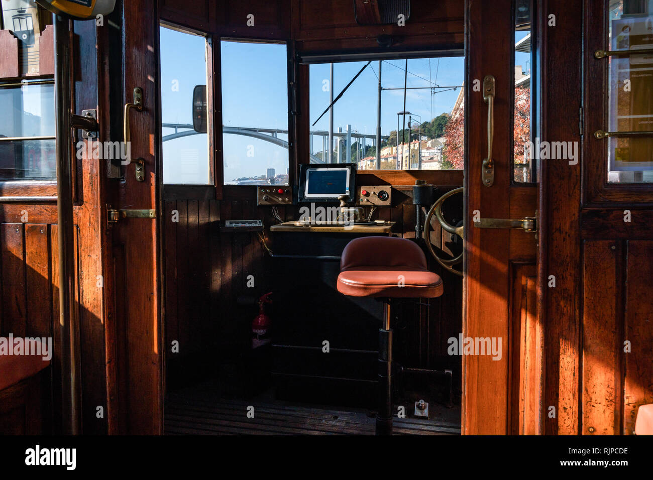 view from inside of the driver room of the old tram in porto city of ...
