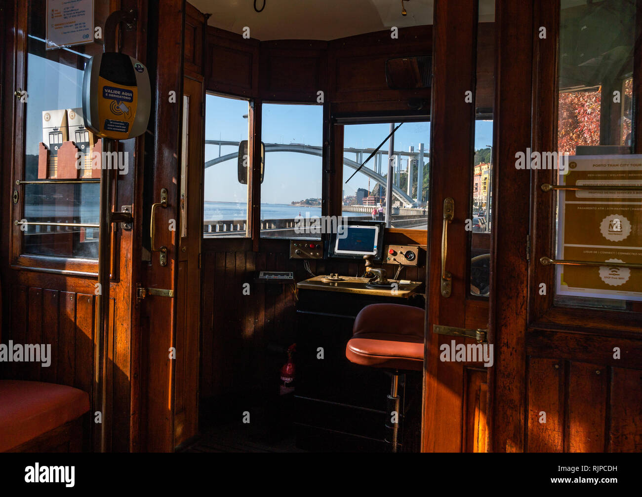 view from inside of the driver room of the old tram in porto city of ...
